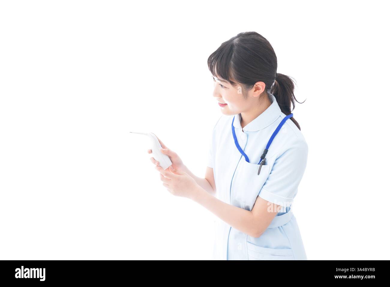 Young nurse taking a temperature Stock Photo - Alamy