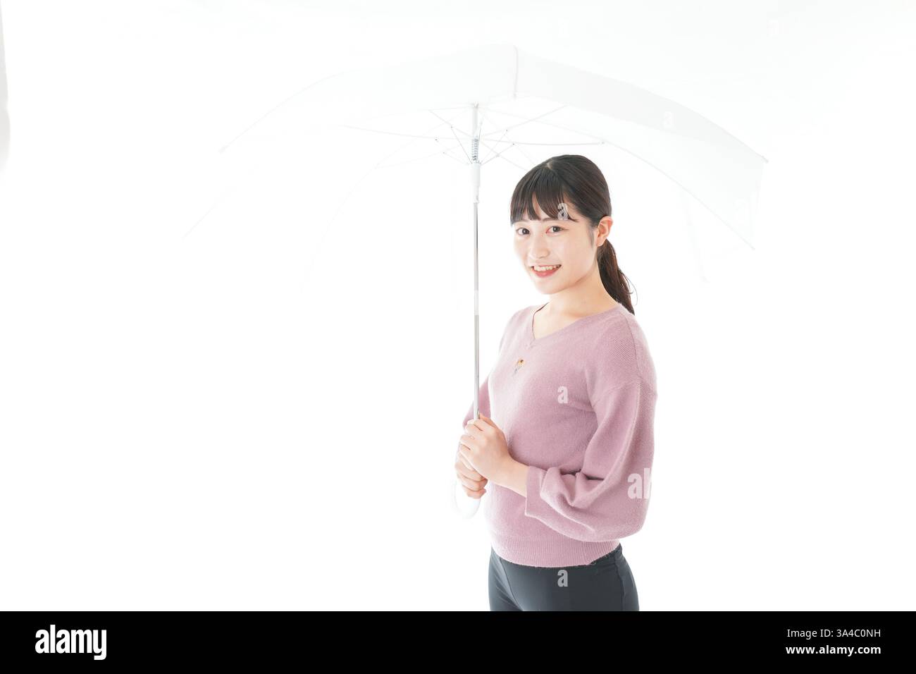 Young woman white cloud Cut Out Stock Images & Pictures - Alamy