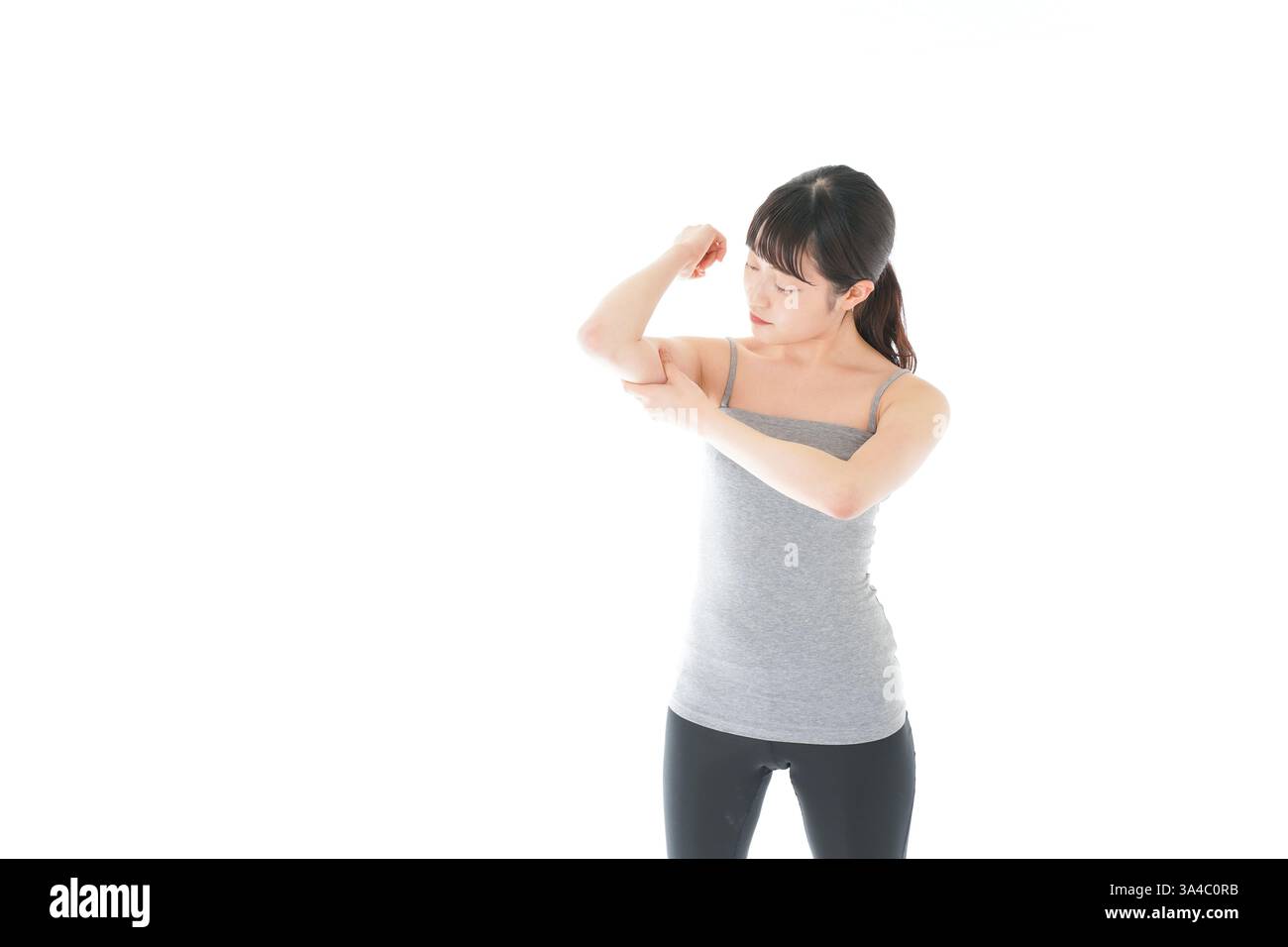 Woman training back muscles Cut Out Stock Images & Pictures - Alamy