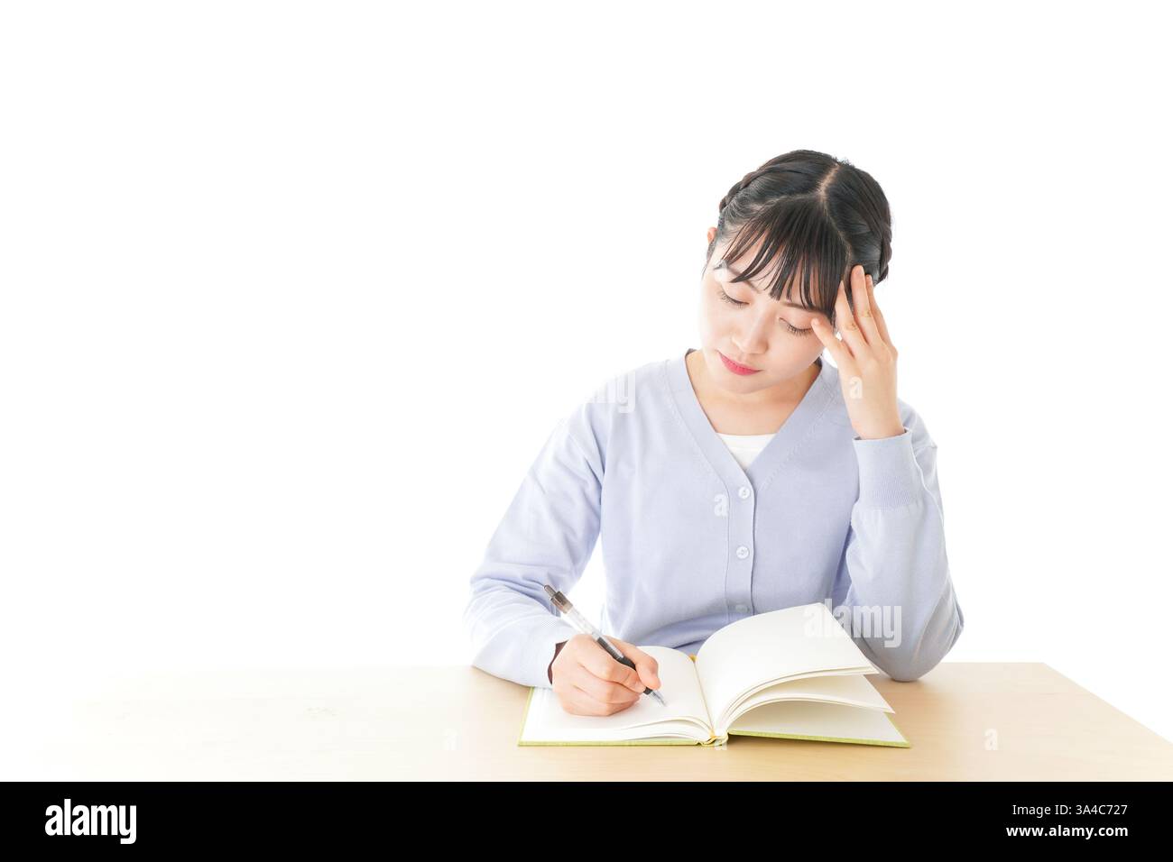 Distressed young female students Stock Photo - Alamy