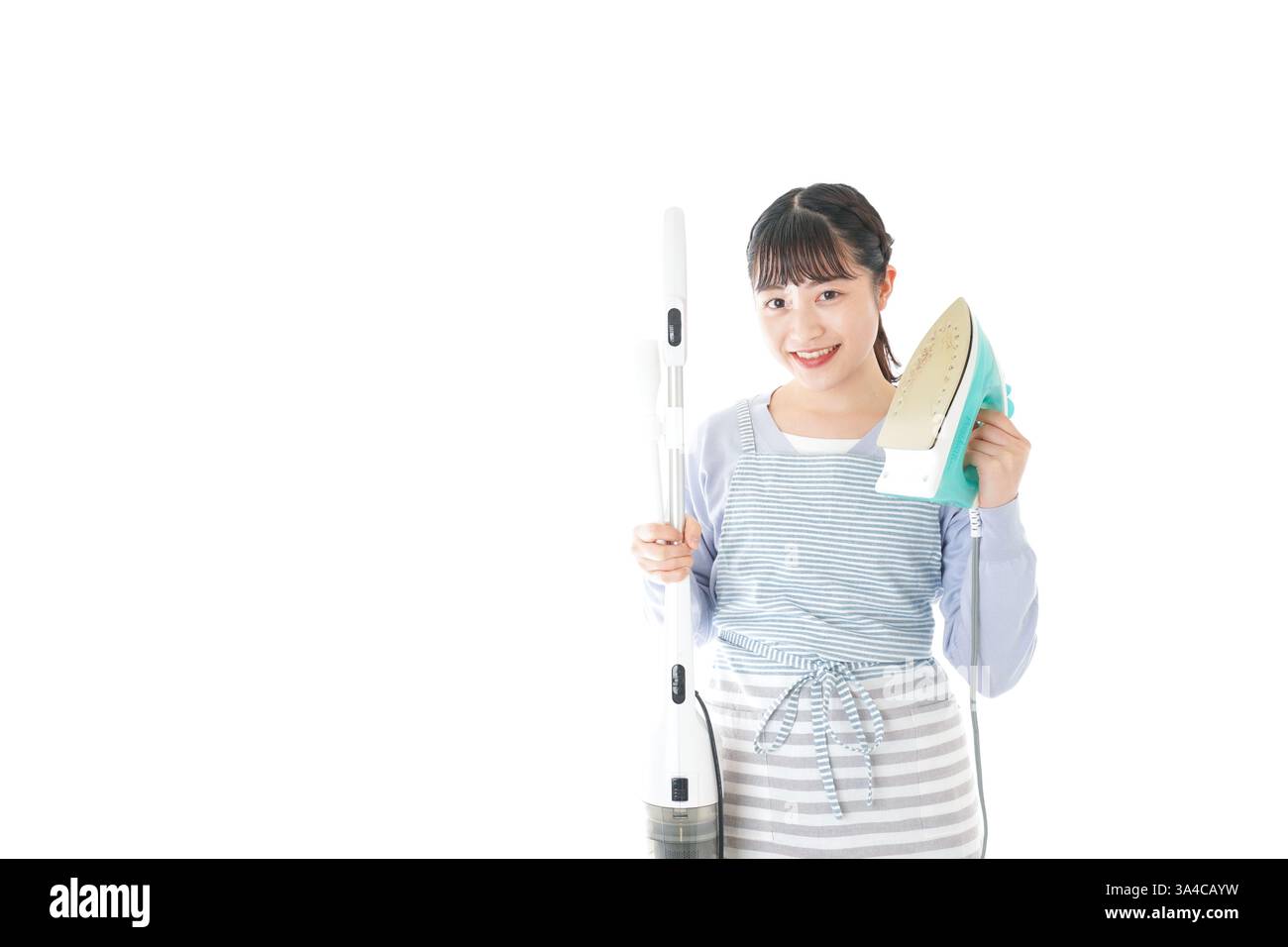 Beautiful housewife cooking Cut Out Stock Images & Pictures - Alamy