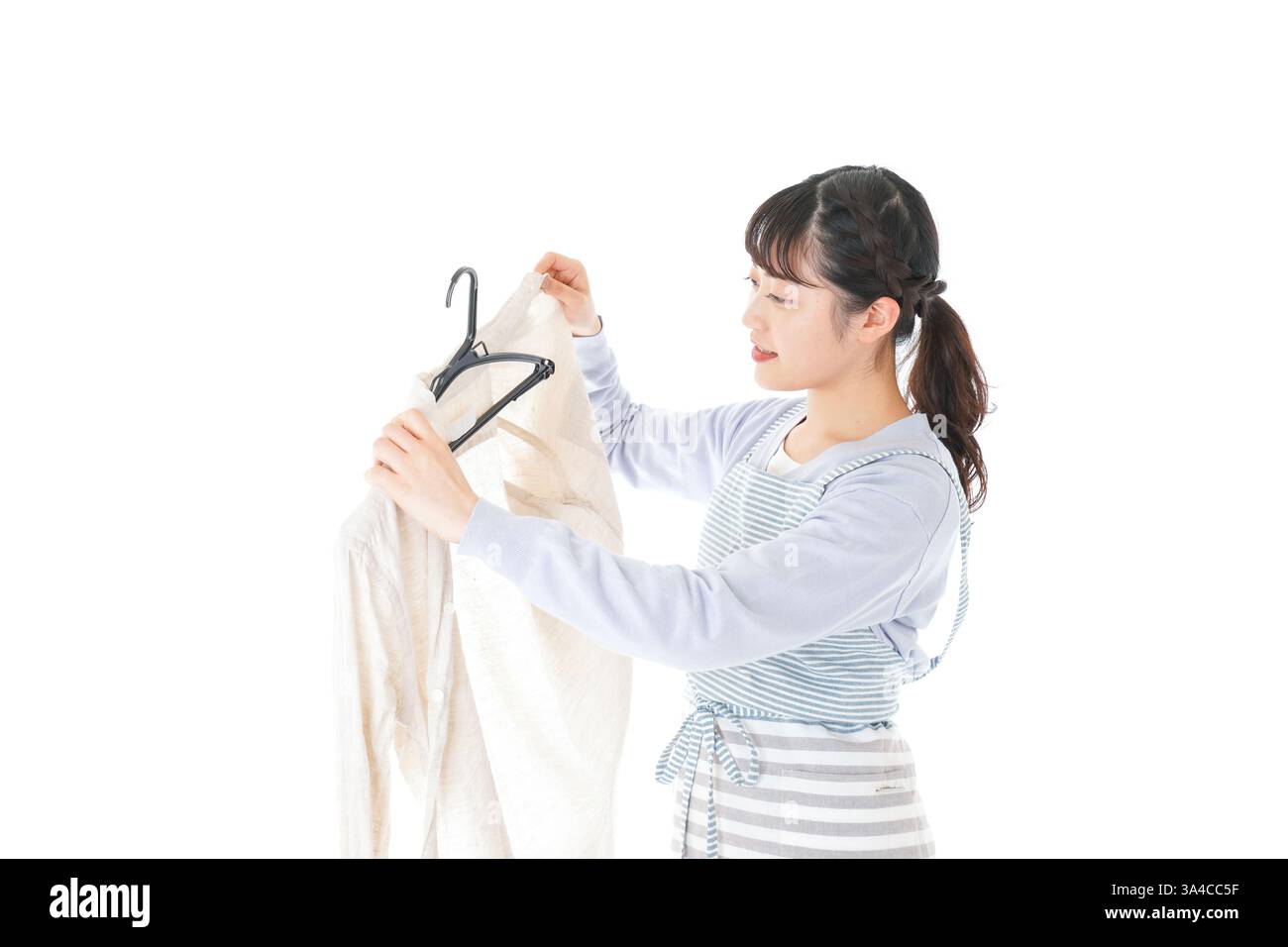 Washing machine clothes woman Cut Out Stock Images & Pictures - Alamy