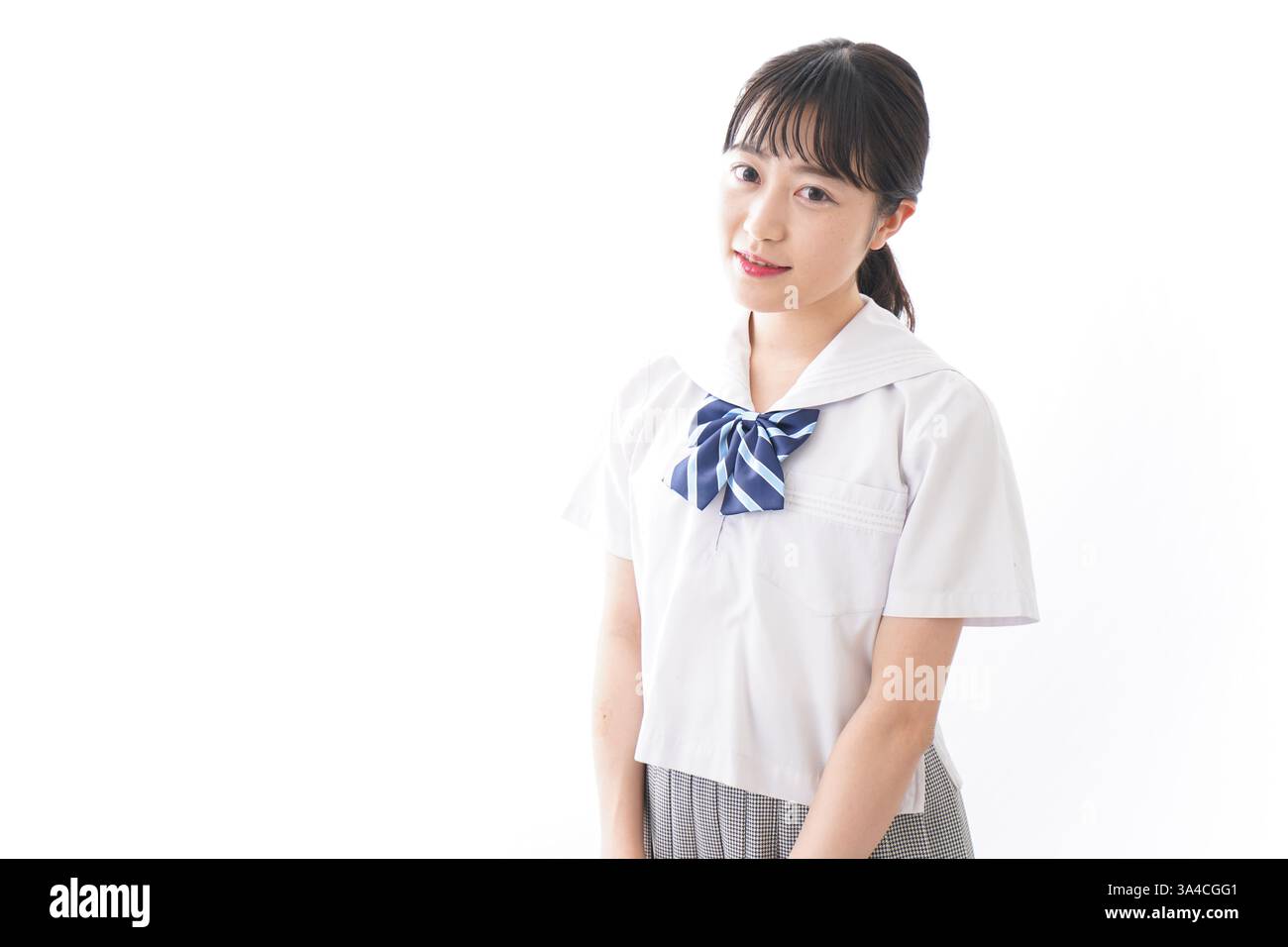 Smiling female high school student in uniform Stock Photo - Alamy