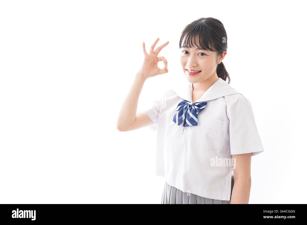 Smiling female high school student in uniform Stock Photo - Alamy