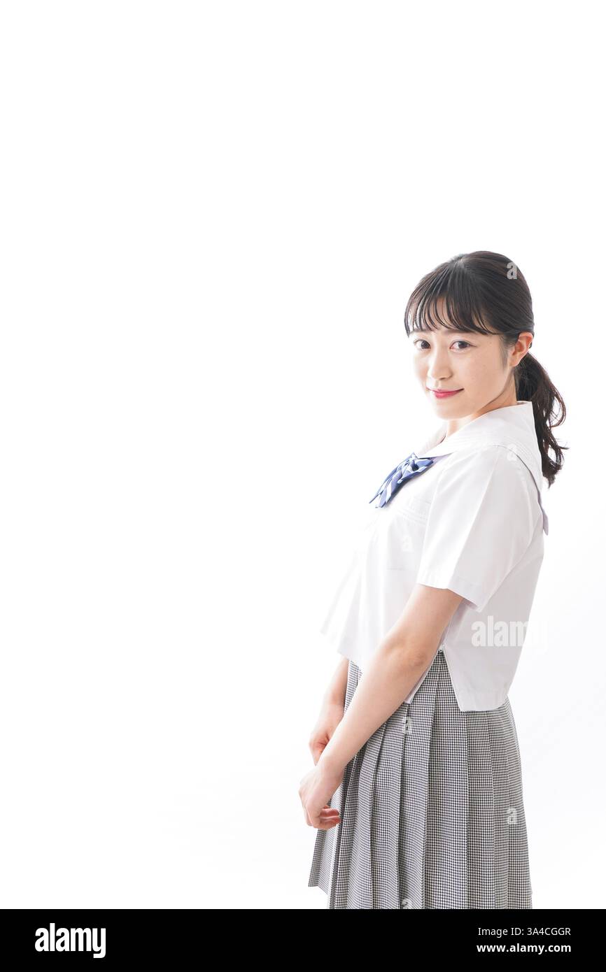 Smiling female high school student in uniform Stock Photo - Alamy