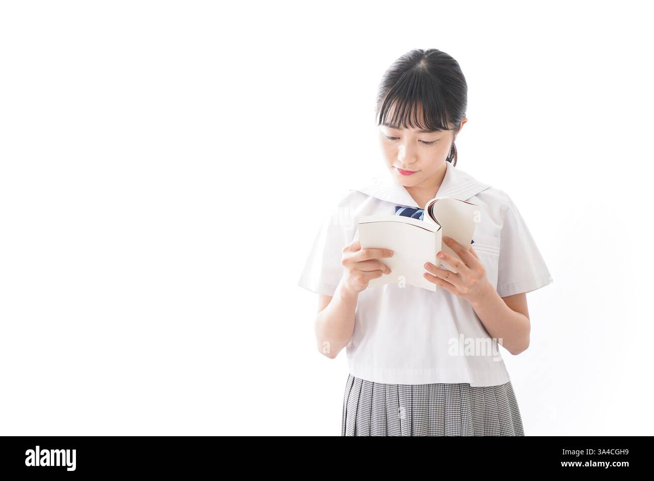 Smiling female high school student in uniform Stock Photo - Alamy