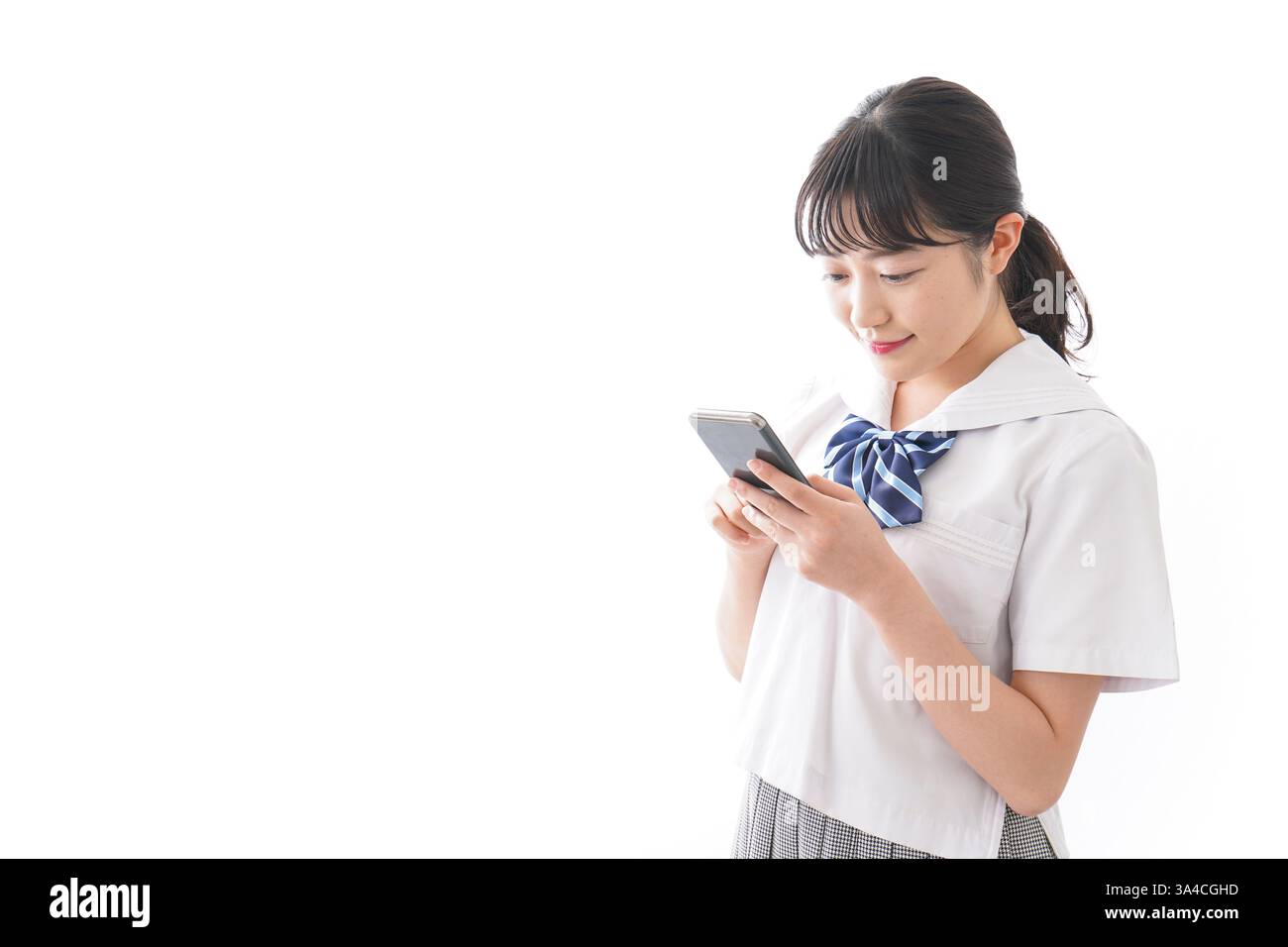 Smiling female high school student in uniform Stock Photo - Alamy