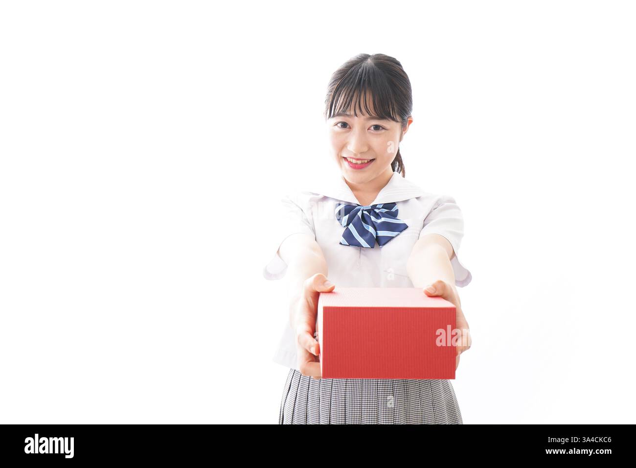 Student giving a gift Stock Photo - Alamy