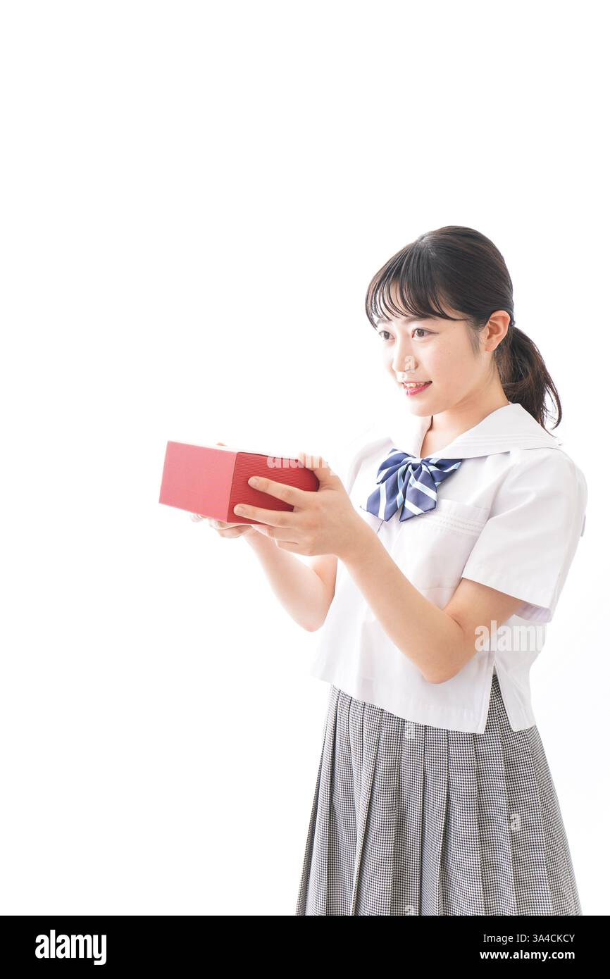 Student giving a gift Stock Photo - Alamy