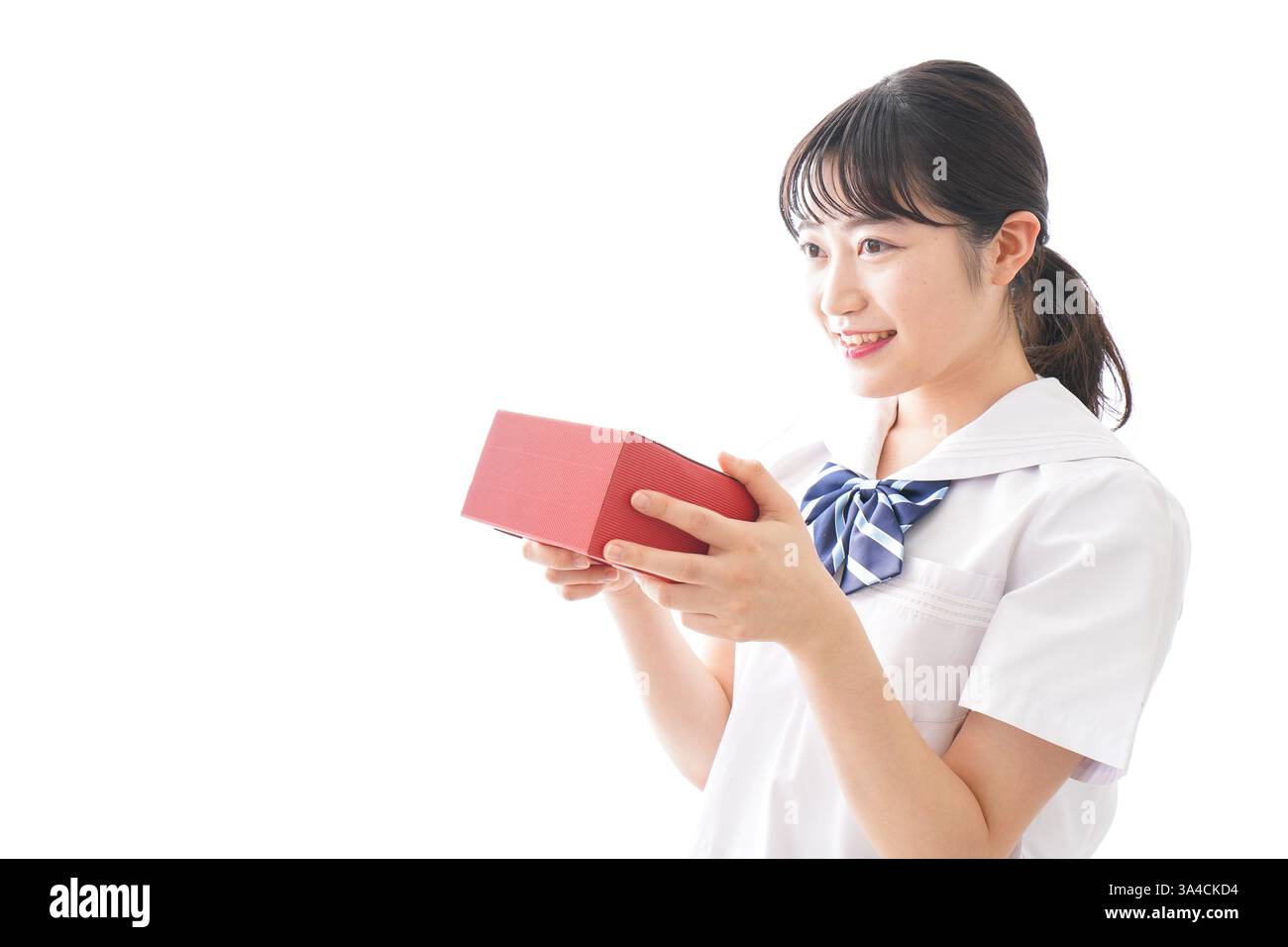 Student giving a gift Stock Photo - Alamy