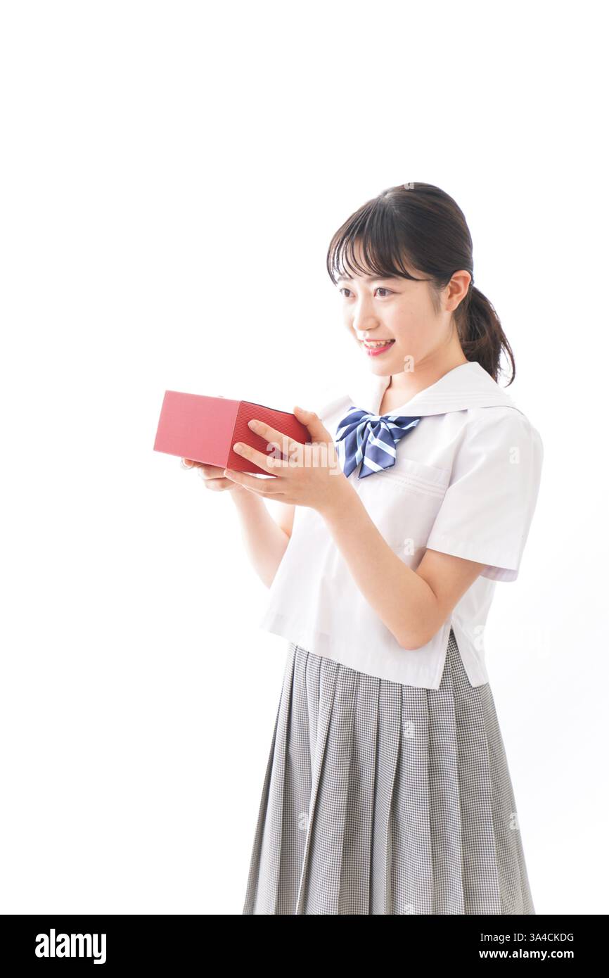 Student giving a gift Stock Photo - Alamy