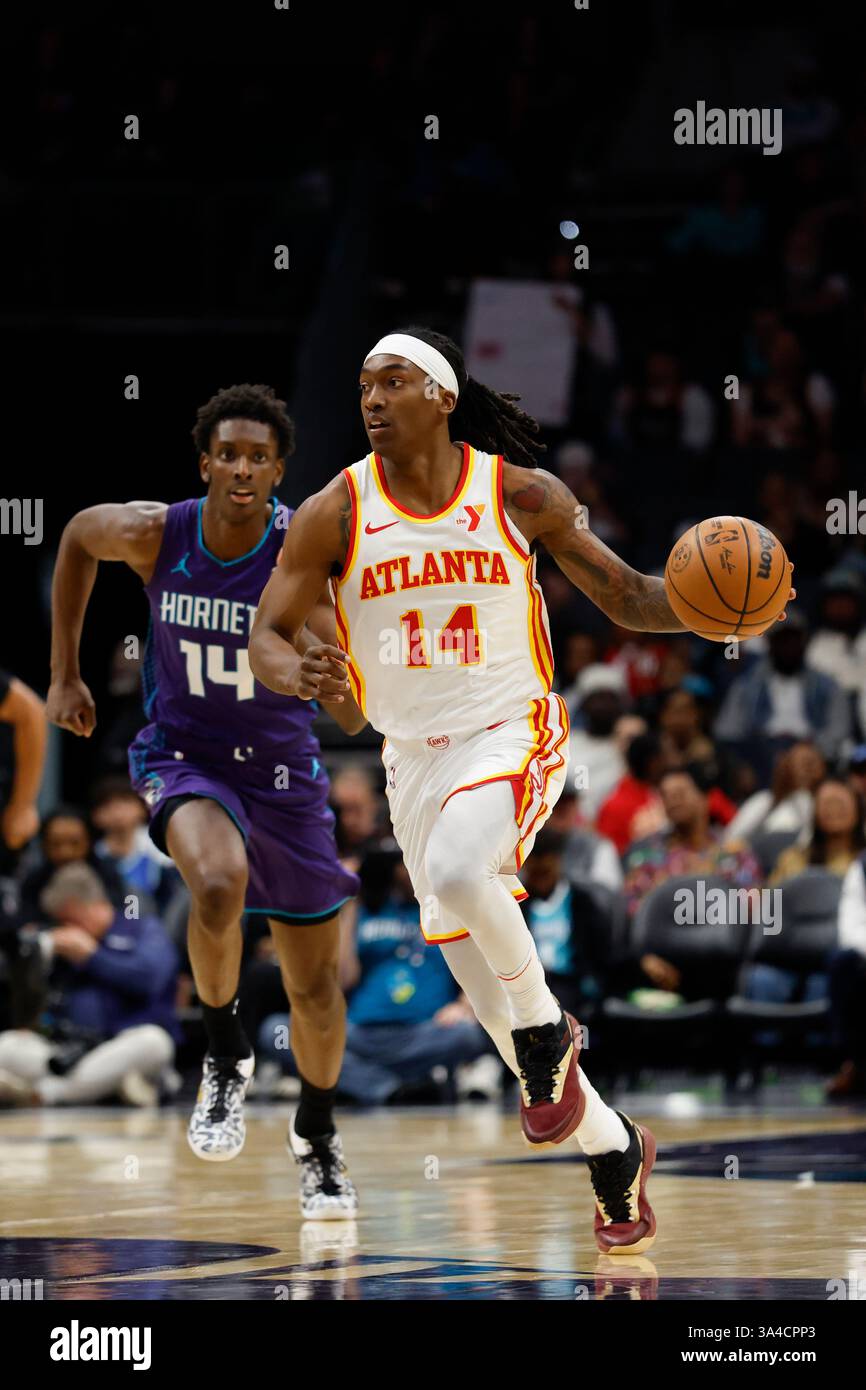 Atlanta Hawks guard Terance Mann (14) pushes the ball upcourt ahead of ...