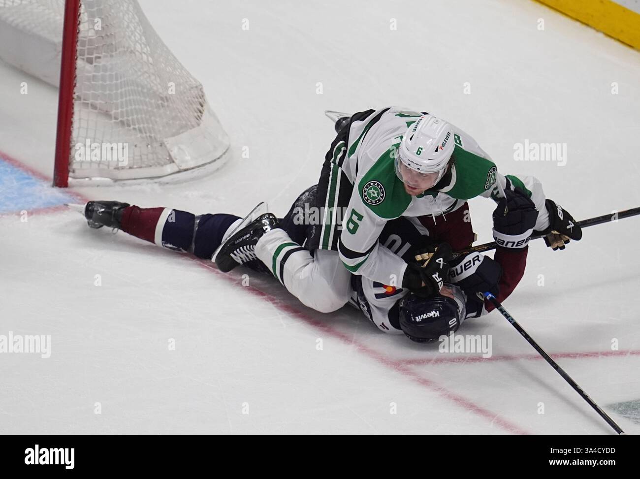 Dallas Stars defenseman Lian Bichsel (6) knocks over Colorado Avalanche ...