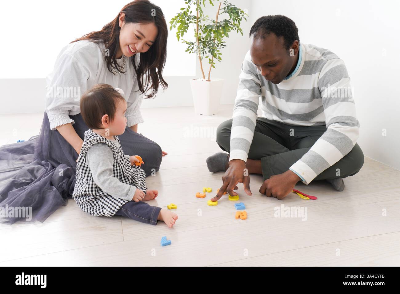 A baby experiencing an English conversation class Stock Photo - Alamy