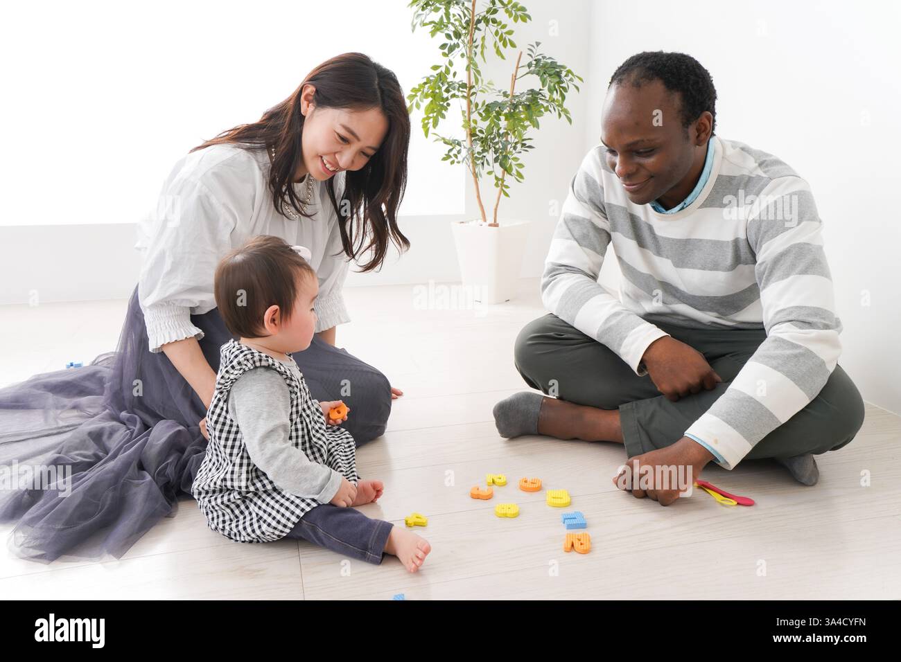 A baby experiencing an English conversation class Stock Photo - Alamy