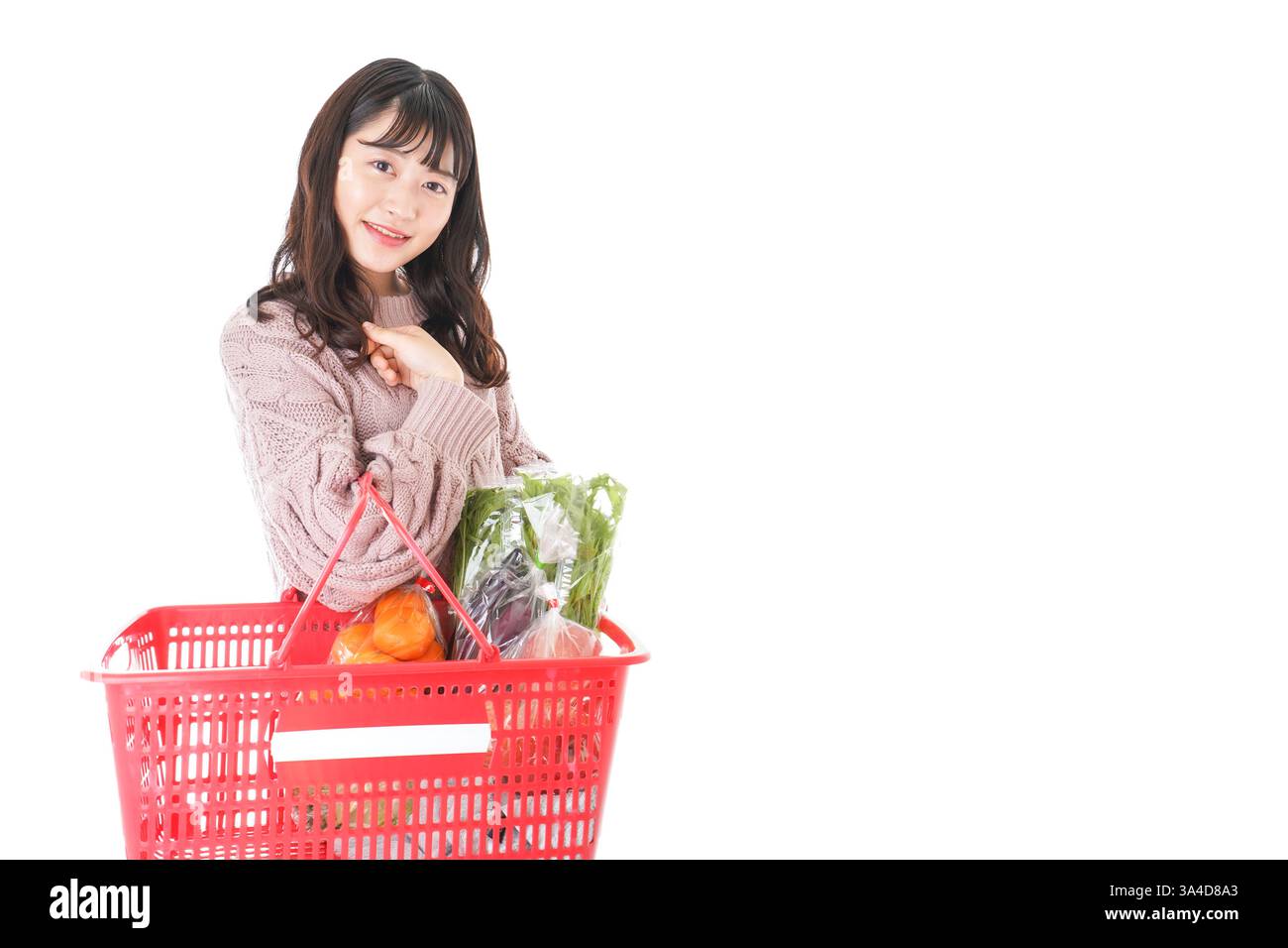 Groceries in supermarket basket Cut Out Stock Images & Pictures - Alamy