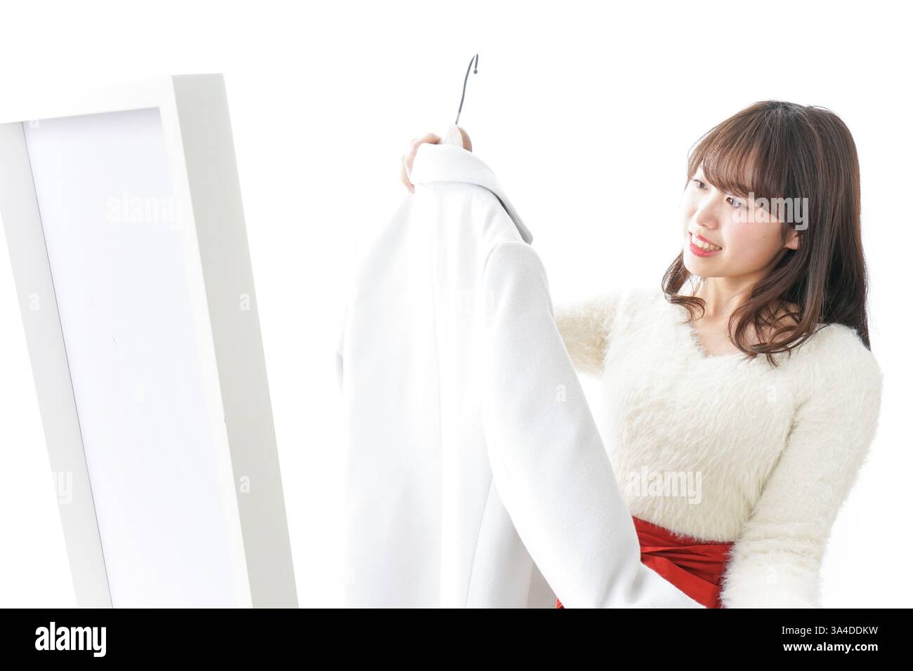 Girl woman clothes shop Cut Out Stock Images & Pictures - Alamy