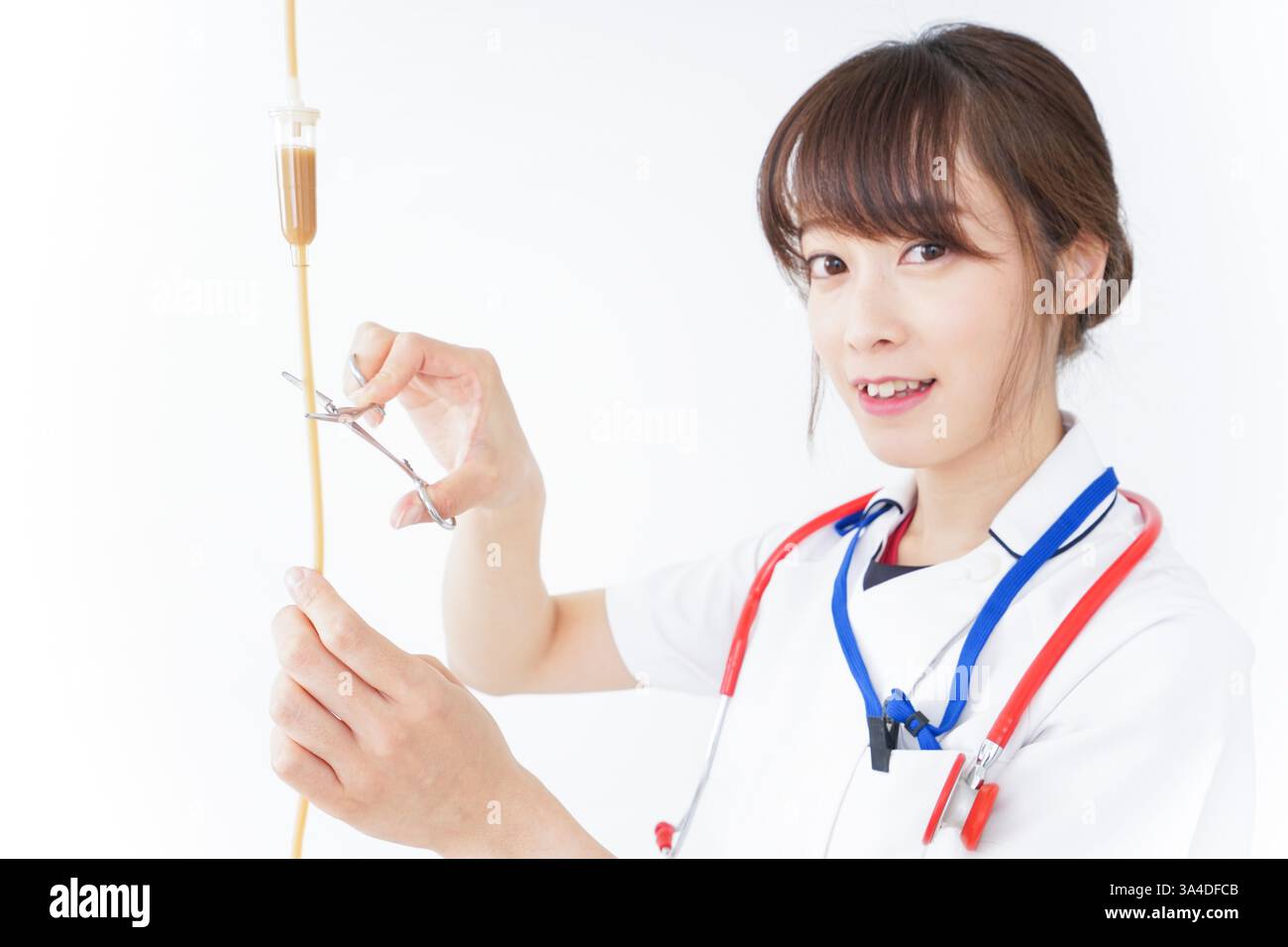 Nurse handling an intravenous drip Stock Photo - Alamy