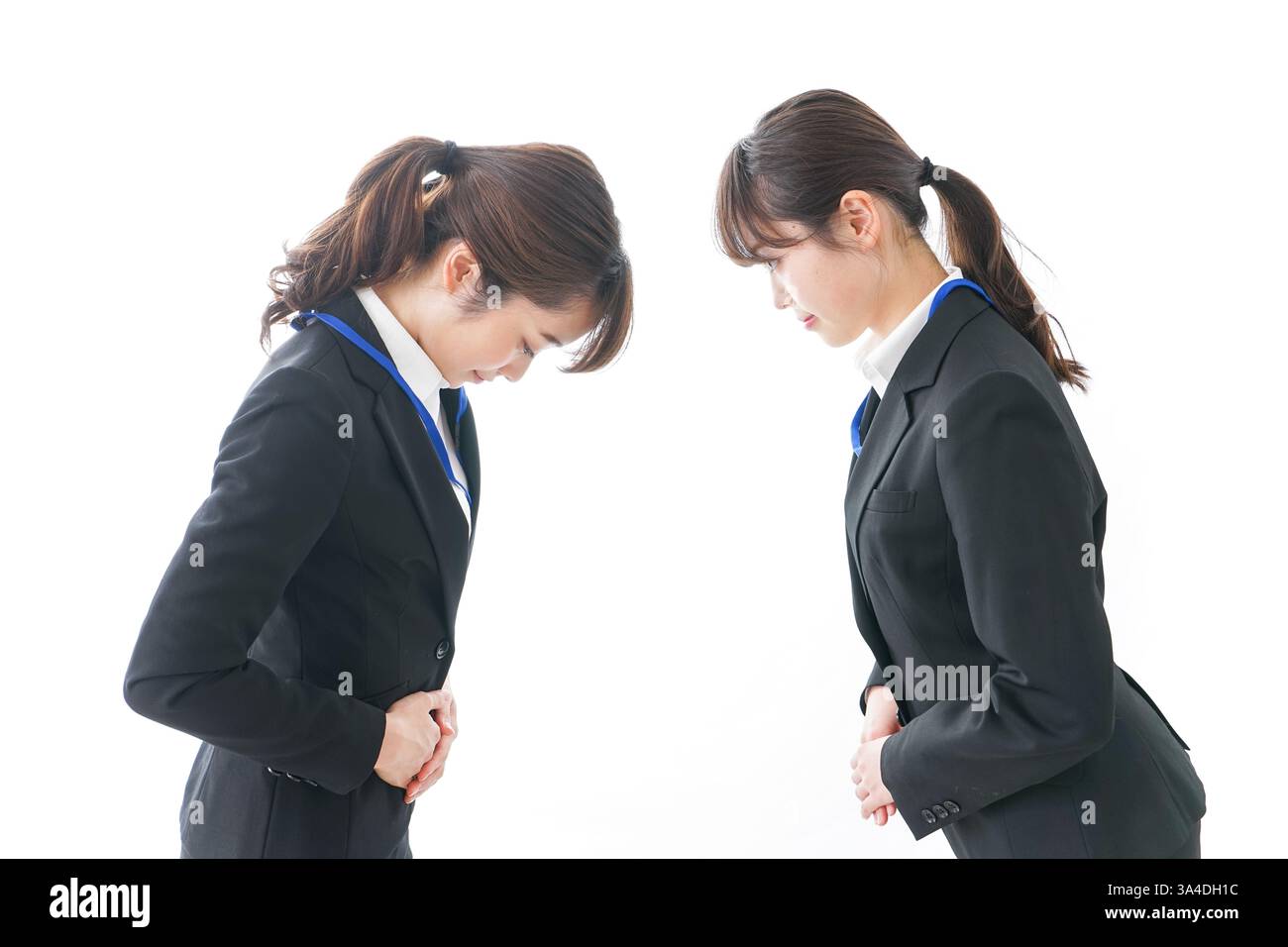 Business people apologising and bowing Stock Photo - Alamy