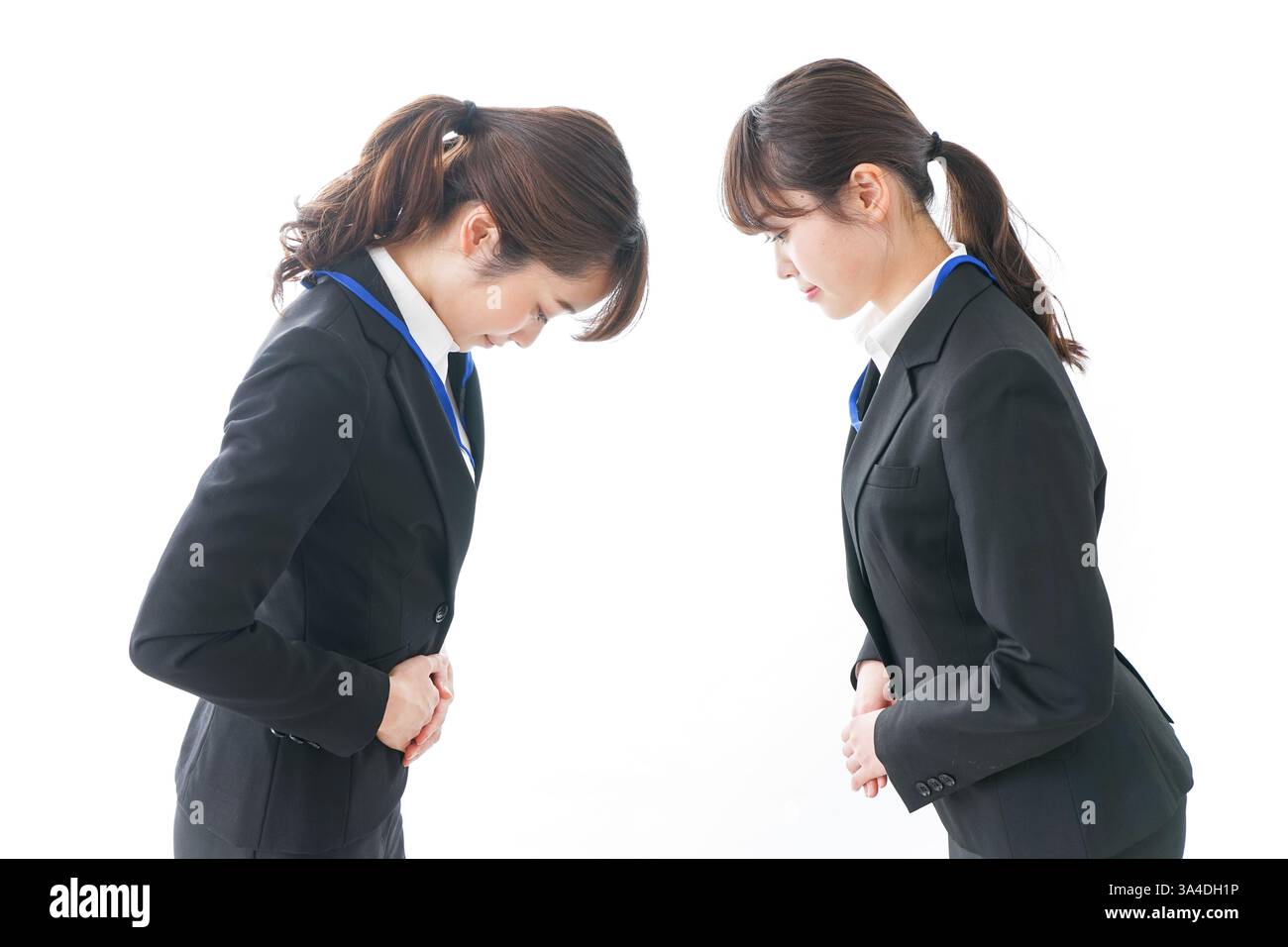 Business people apologising and bowing Stock Photo - Alamy