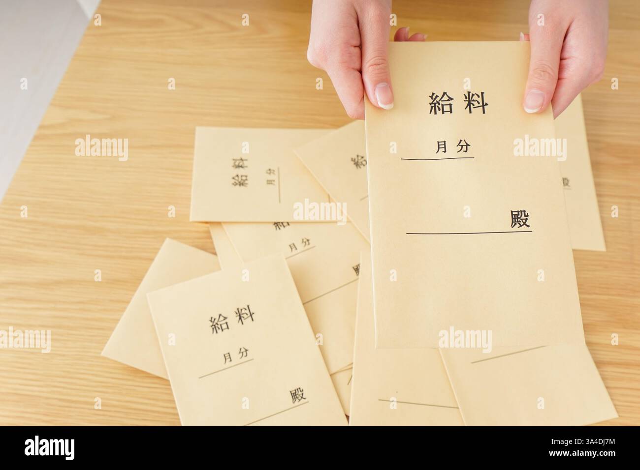 Salary paid hi-res stock photography and images - Alamy