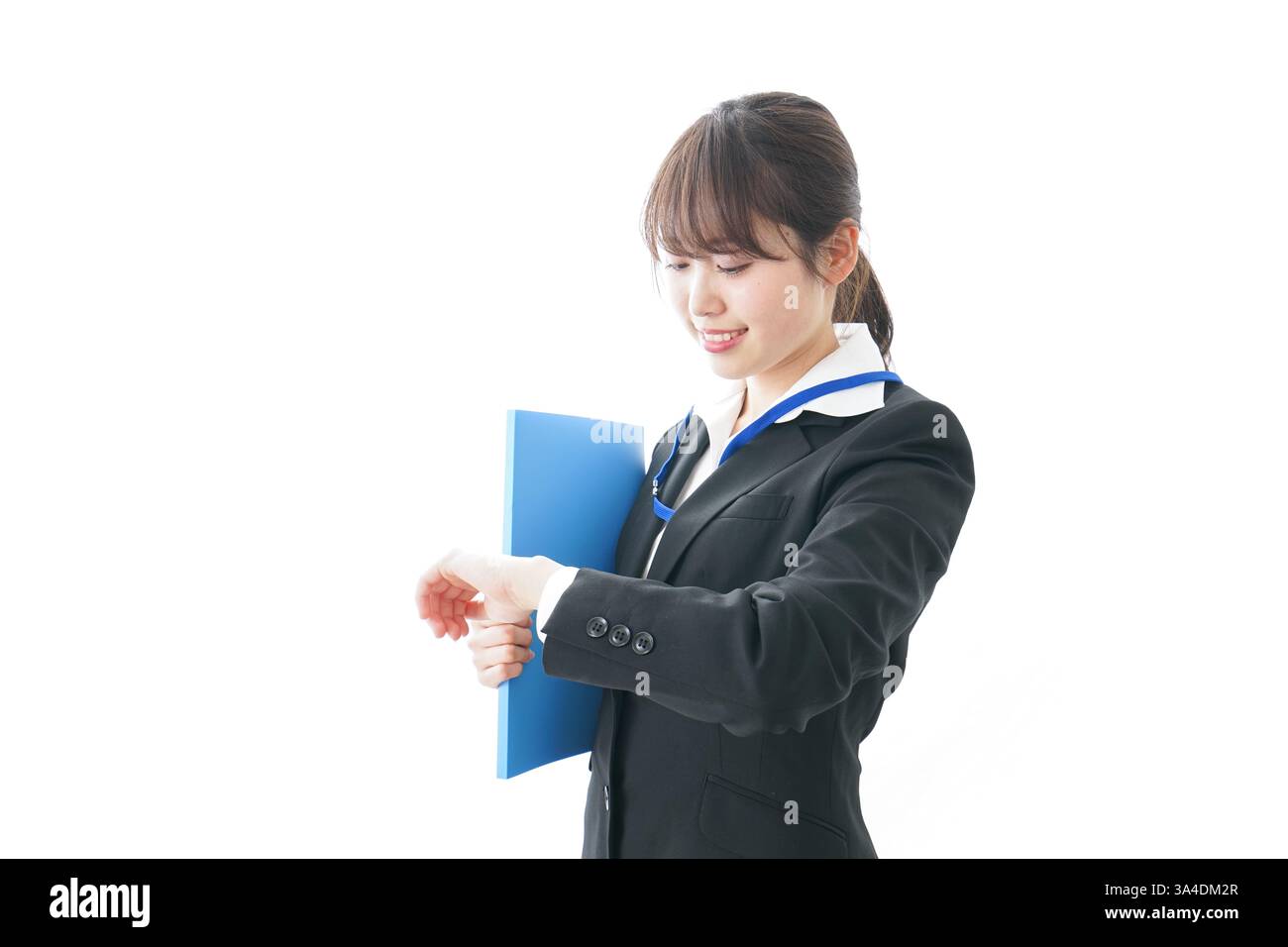 Business people checking their watches Stock Photo - Alamy