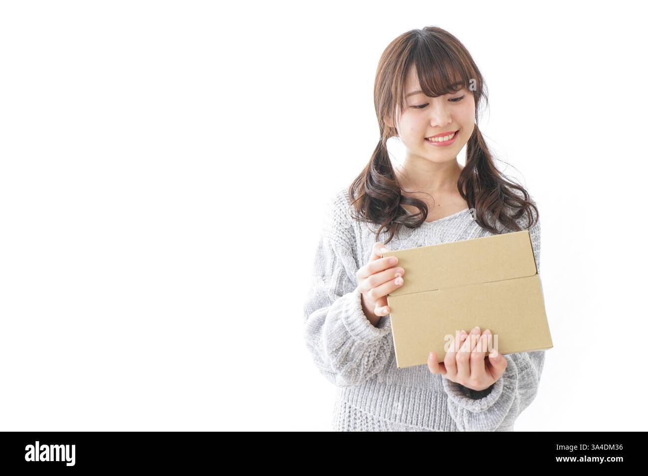 Parcel delivery woman Cut Out Stock Images & Pictures - Alamy