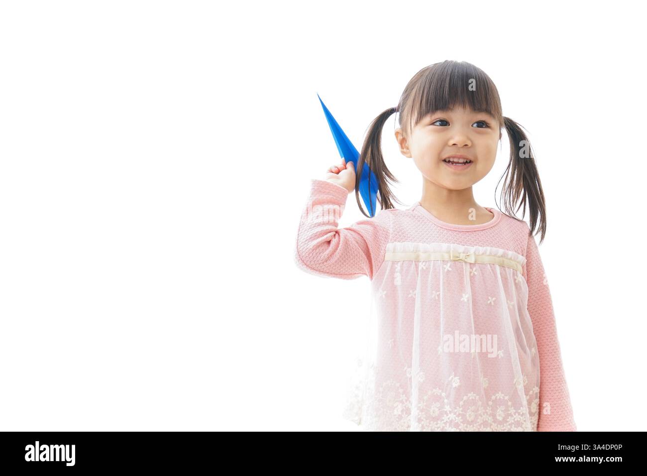 Child flying paper plane travel image Stock Photo - Alamy