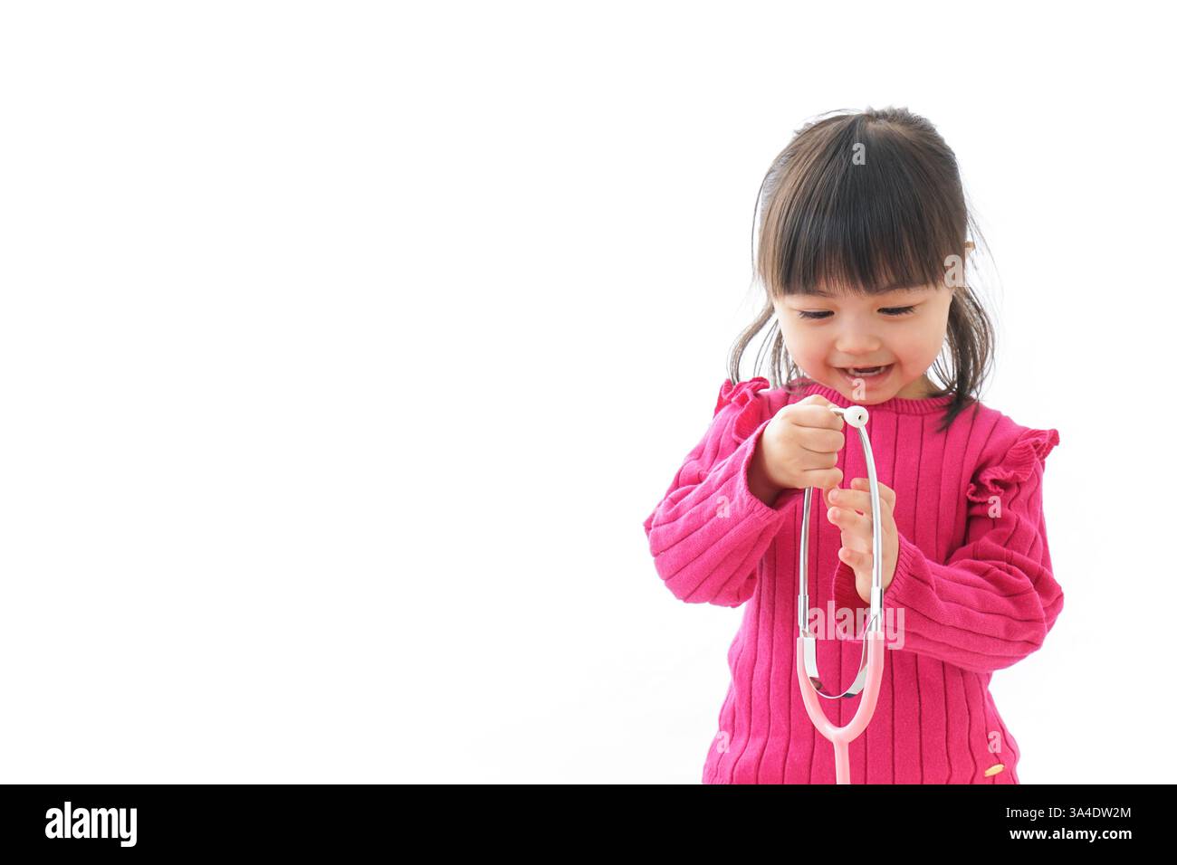 Child playing doctor Stock Photo - Alamy