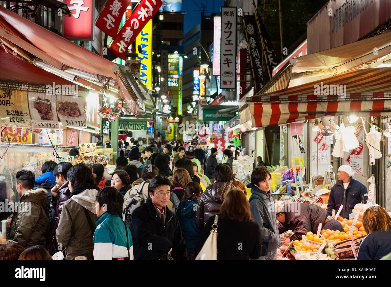 Shoppers cram the narrow lanes of Ameyokocho in the Ueno district of ...