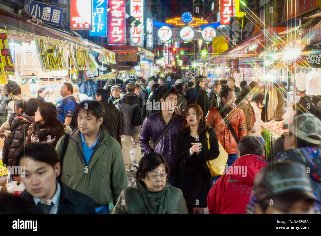 Shoppers cram the narrow lanes of Ameyokocho in the Ueno district of ...