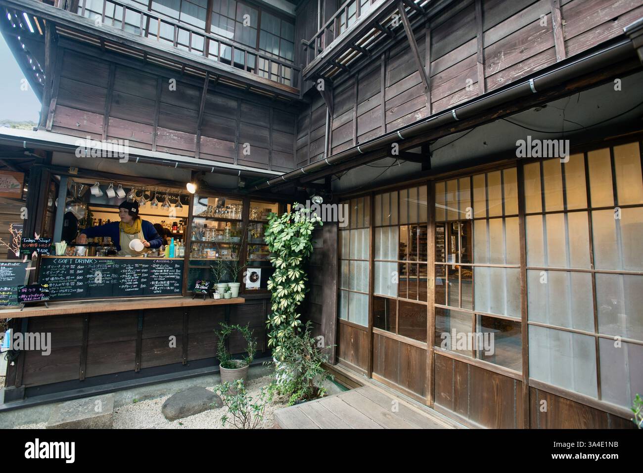Photo shows the Beer Hall inside a rennovated building from the 1930s in the Yanaka Ginza area ...