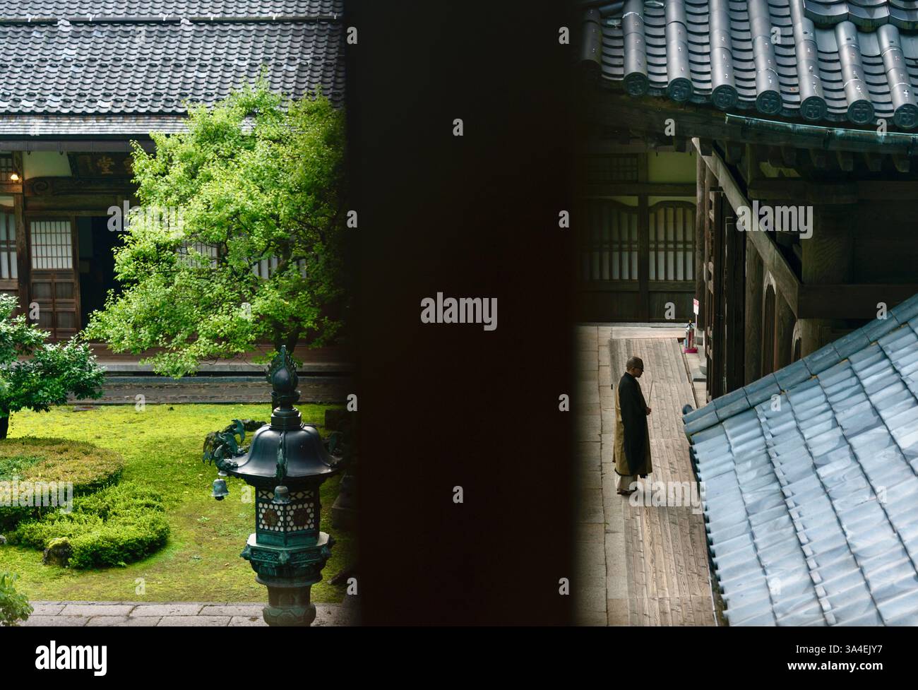 A monk bows as he passes in front of the Hatto, or Dharma Hall, in the ...