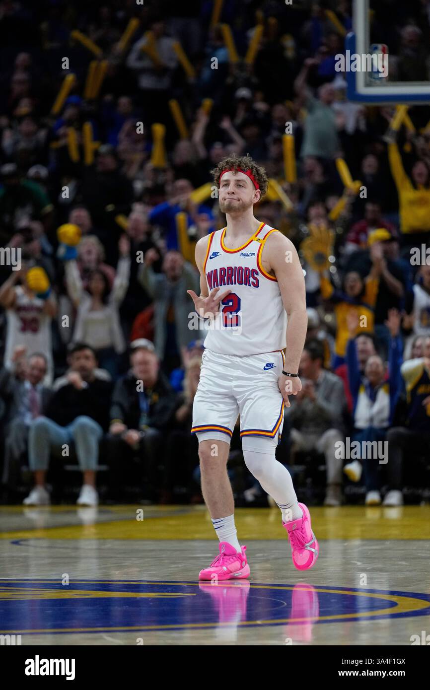 Golden State Warriors guard Brandin Podziemski reacts after making a 3 ...