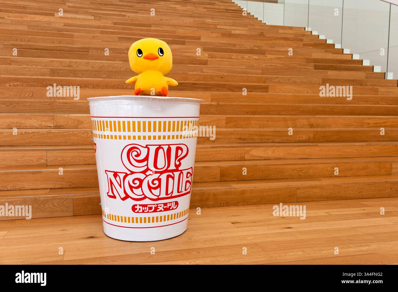 Spacious, multi-story interior entrance lobby at the Nissin Cup Noodles ...