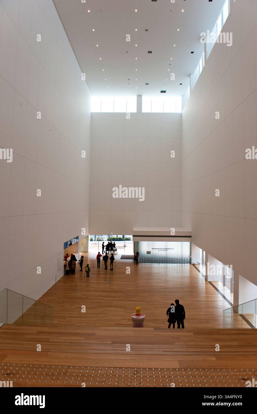 Spacious, multi-story interior entrance lobby at the Nissin Cup Noodles ...