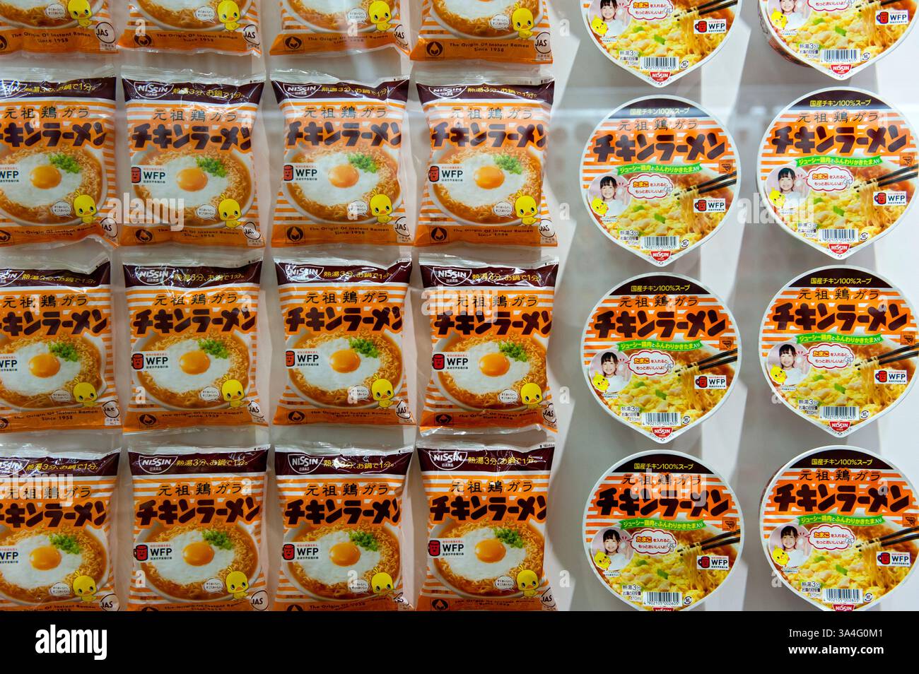 Variety of noodle soup products on display wall in the Instant Noodles ...