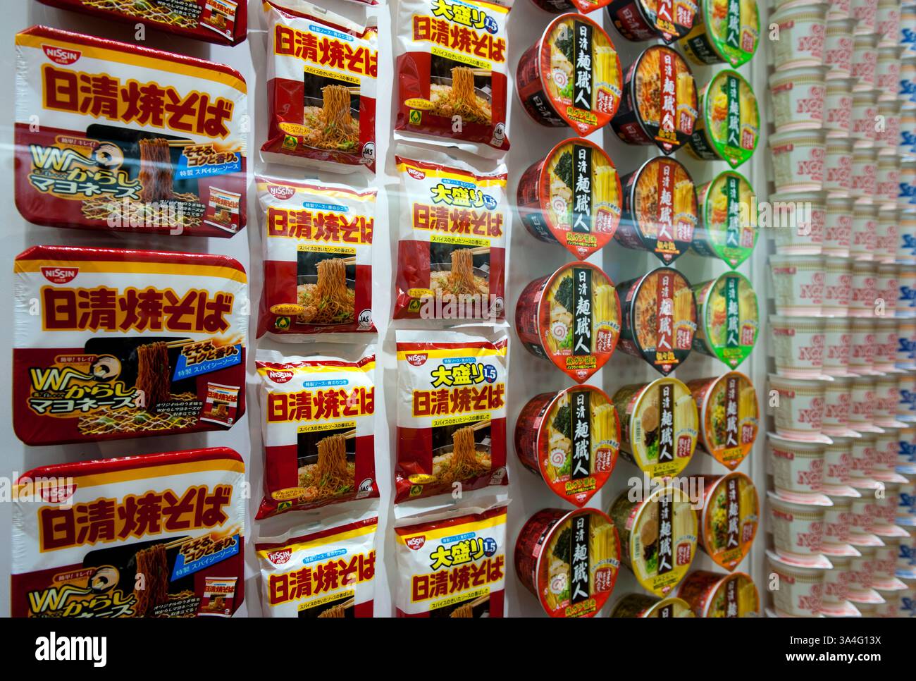 Variety of noodle soup products on display wall in the Instant Noodles ...