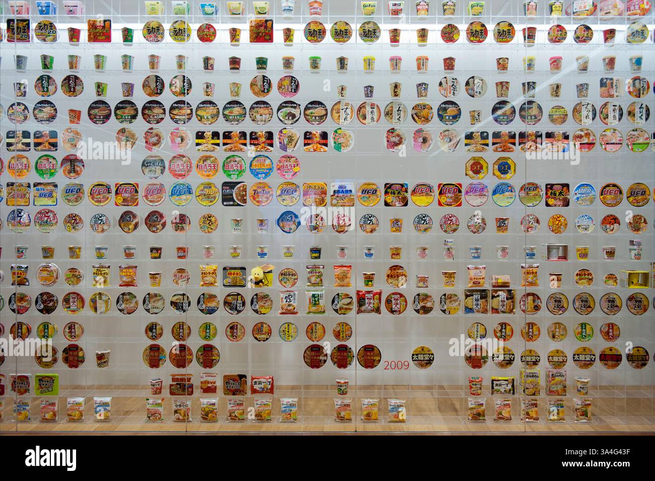 Variety of noodle soup products on display wall in the Instant Noodles ...