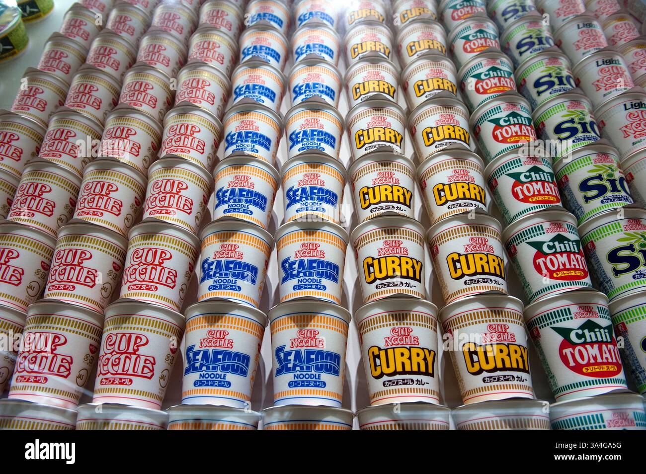 Variety of noodle soup products on display wall in the Instant Noodles ...