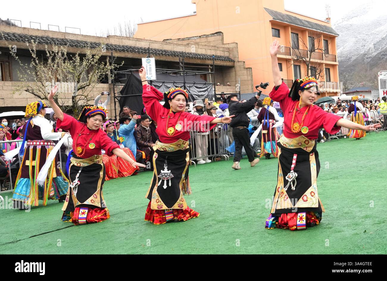 Aba,China.18th March 2025. Dance enthusiasts in attires perform in ...