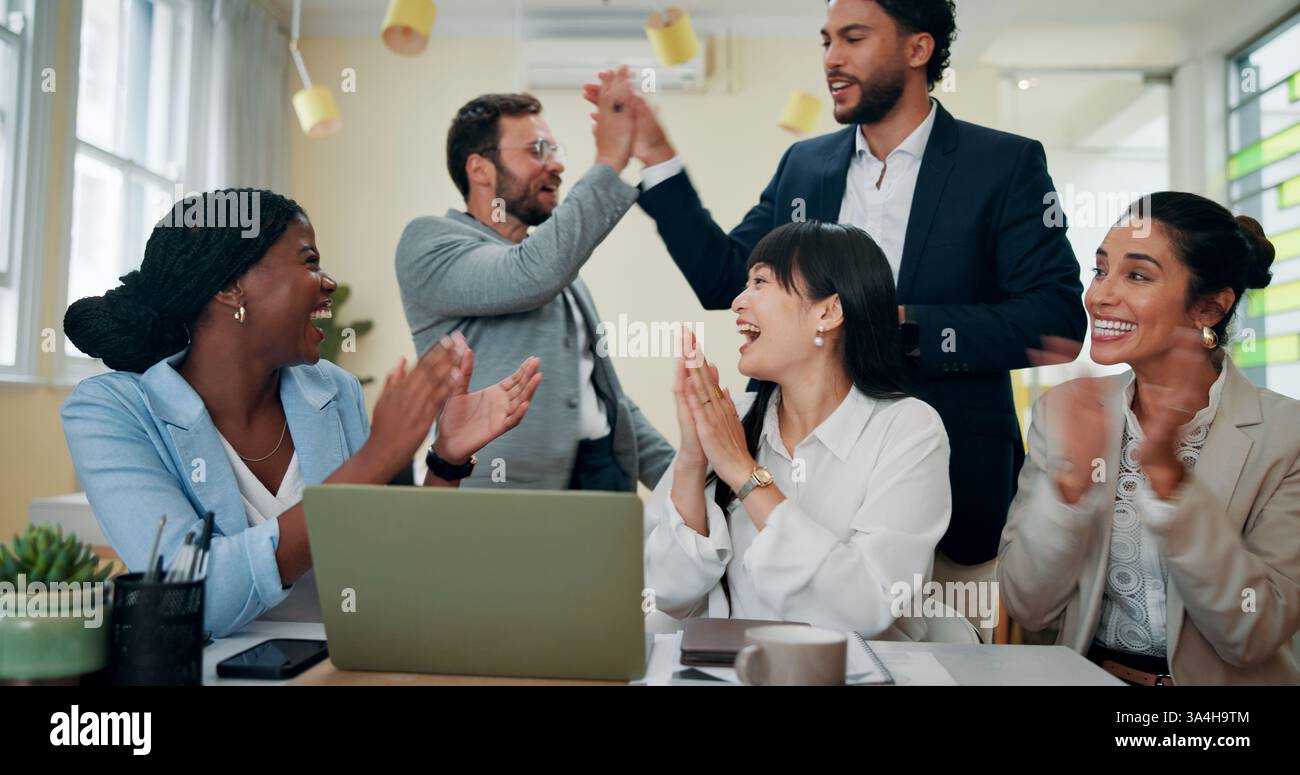 Business people, laptop and applause with high five, teamwork and success for project funding ...