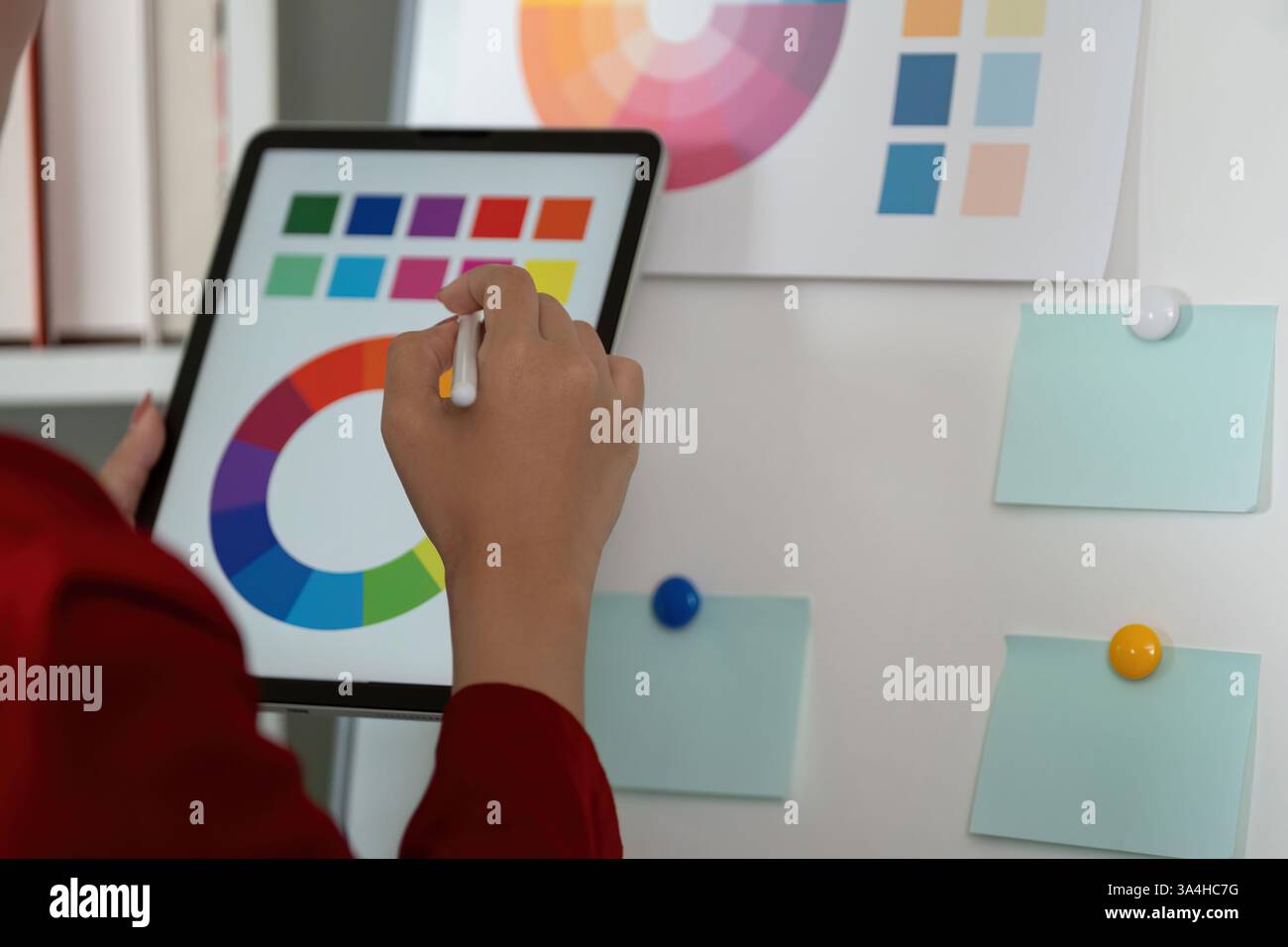 Graphic Design Process and Color Exploration. A designer analyzes color ...