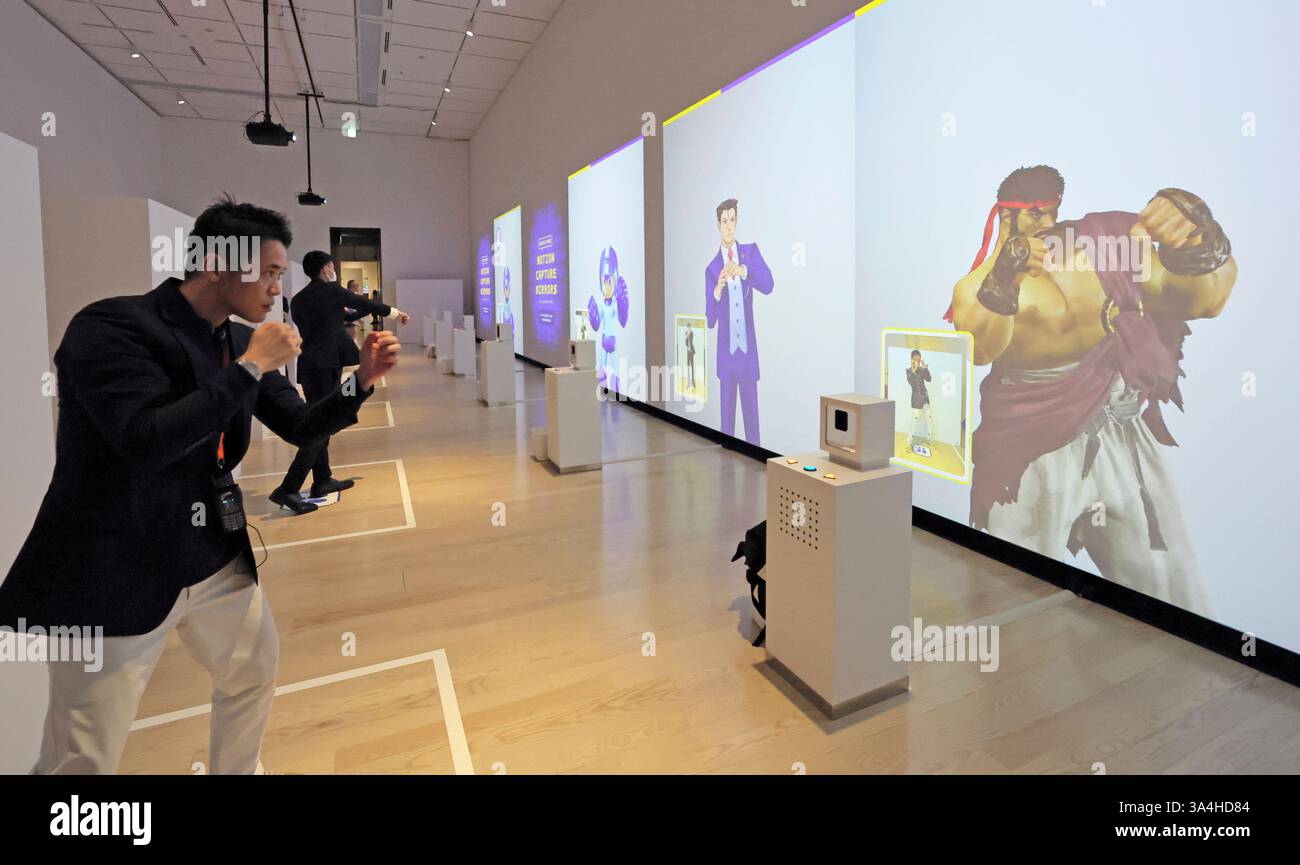 Attendees tour the preview of "Capcom Creation –moving hearts across ...