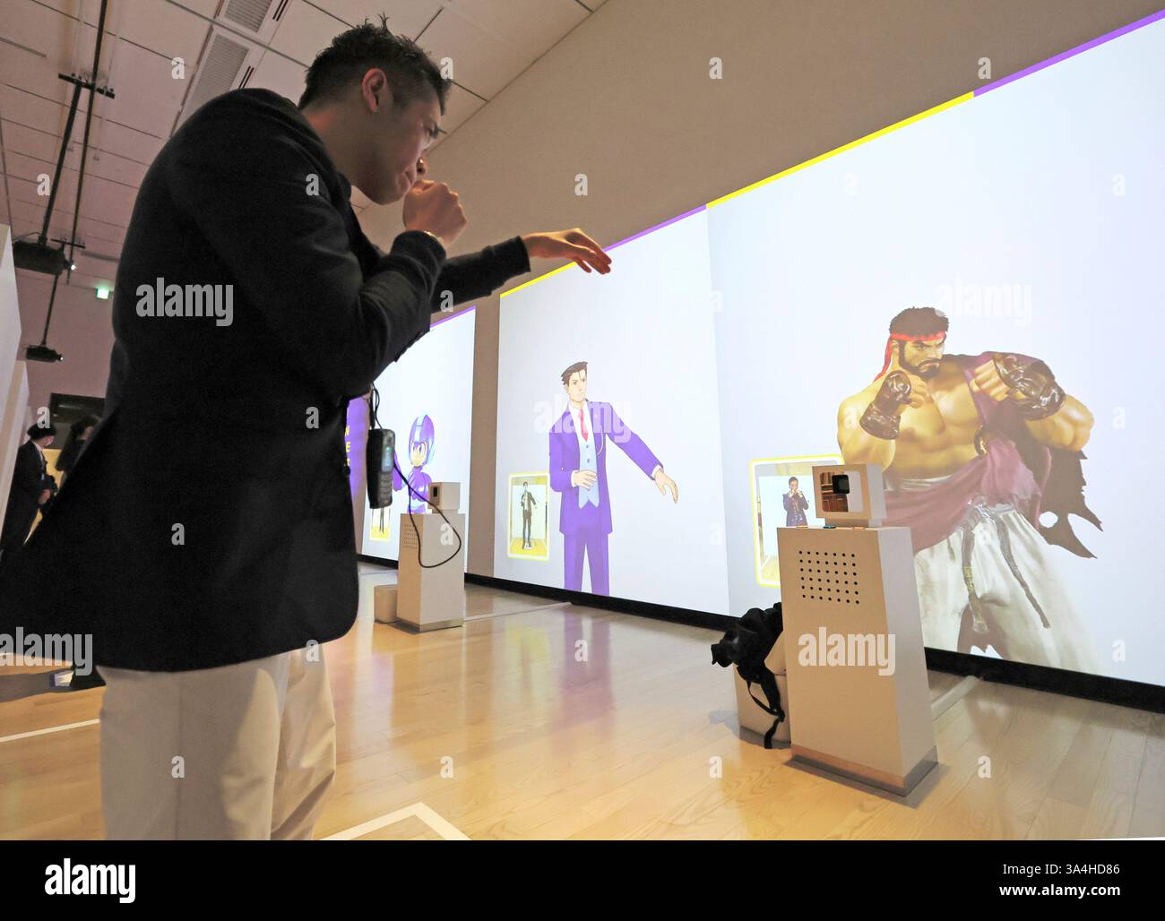 Attendees tour the preview of "Capcom Creation –moving hearts across ...