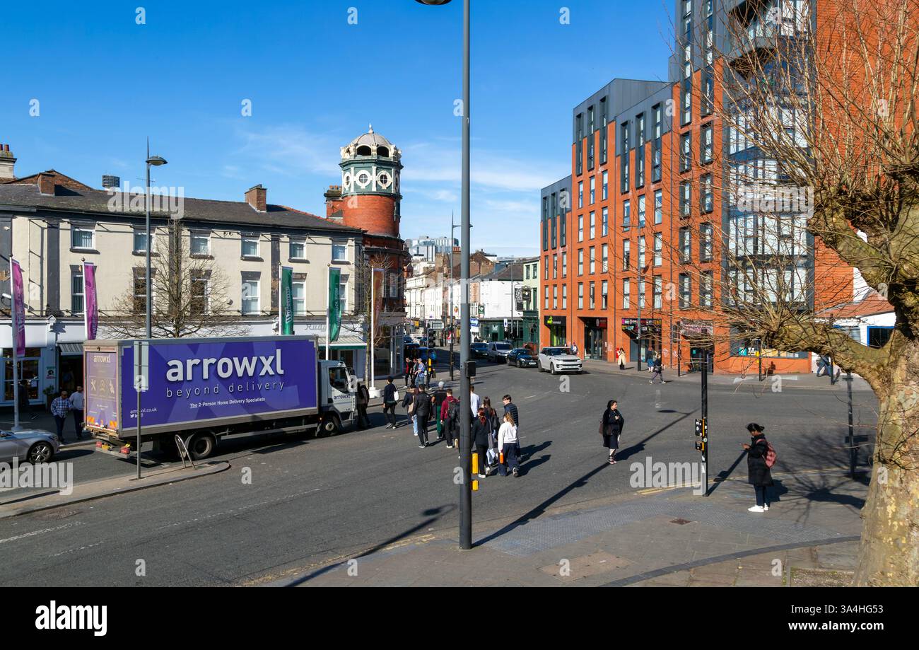 View of people and traffic on corner leading to Renshaw Street, city ...