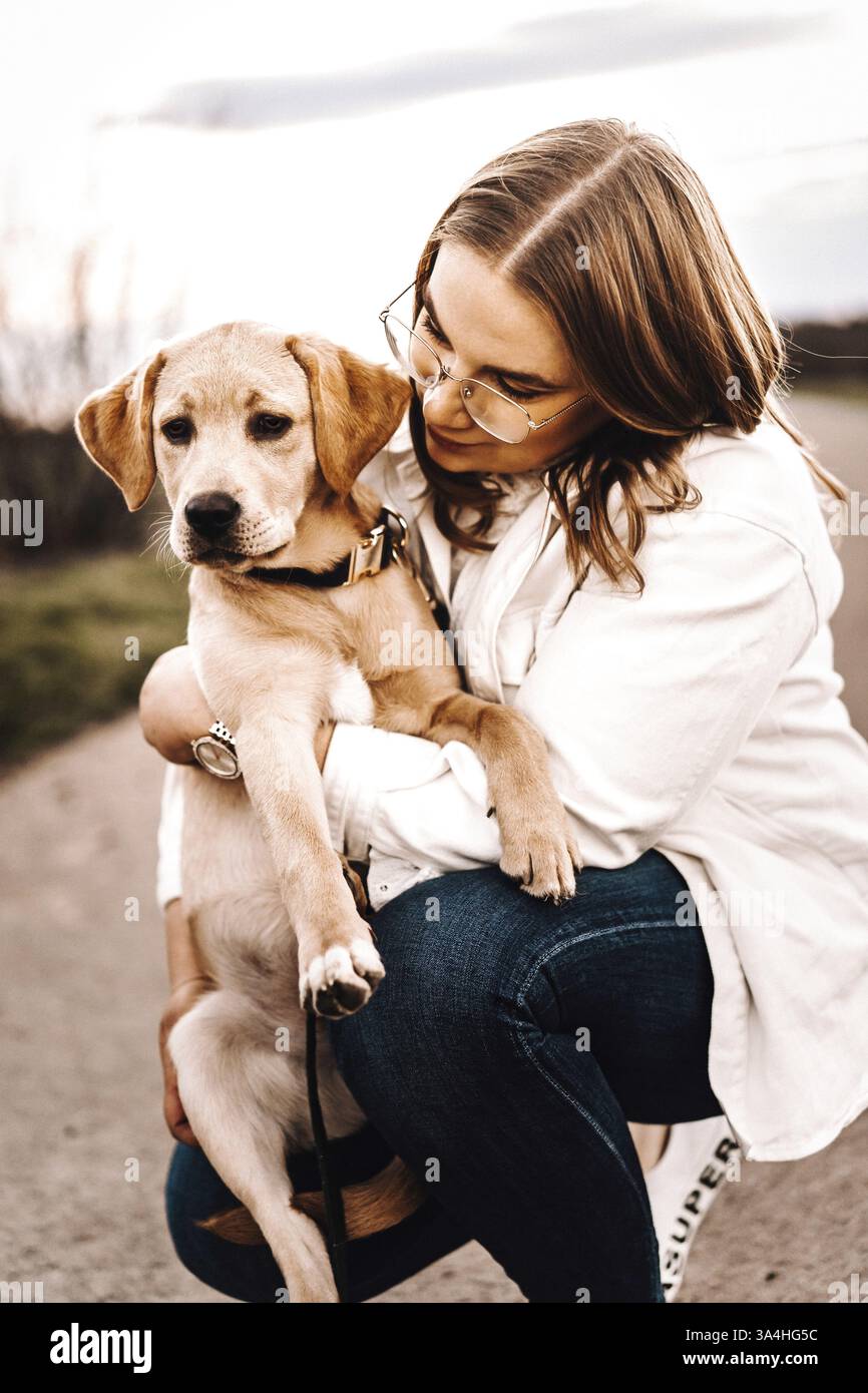 Picture woman young labrador hi-res stock photography and images - Alamy