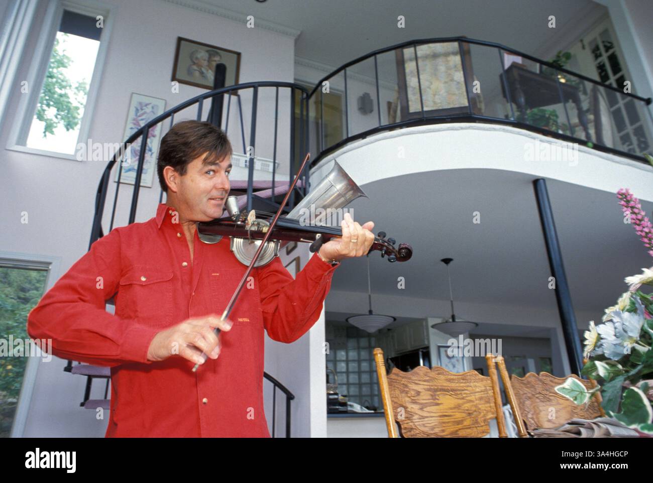 Jun 25, 1992; Branson, MO, USA; Comedian/musician JIM STAFFORD at home ...
