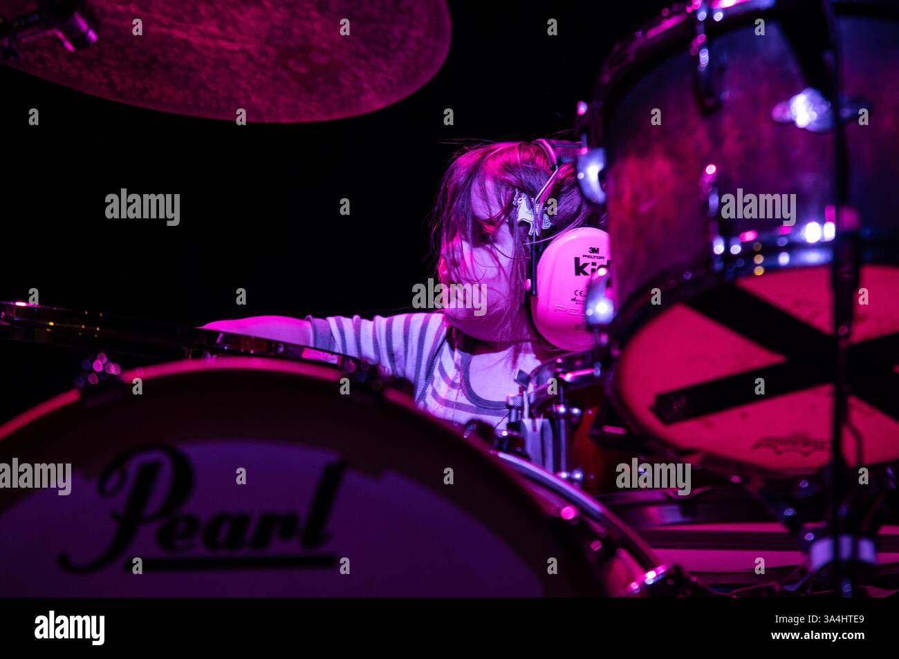 London, United Kingdom. 18th March 2025. Little Billie May Doherty helping daddy Peter on drums ...