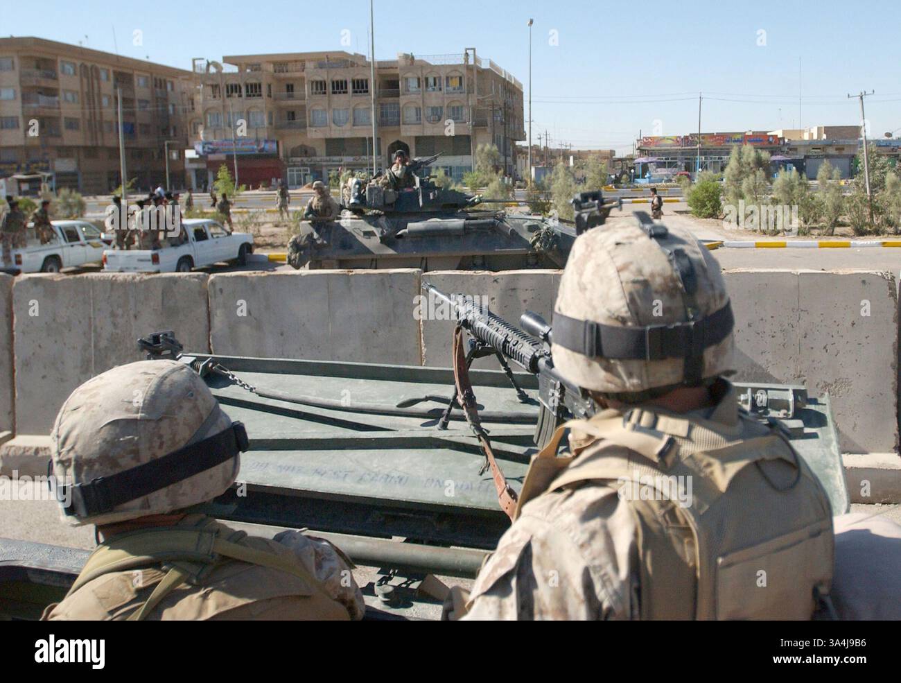 Jun 15, 2004; Fallujah, Iraq; Two snipers from 2nd Battalion, 2nd ...